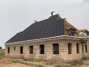Construction of Shingle Gerald Roof in Ibadan - Building Materials ...